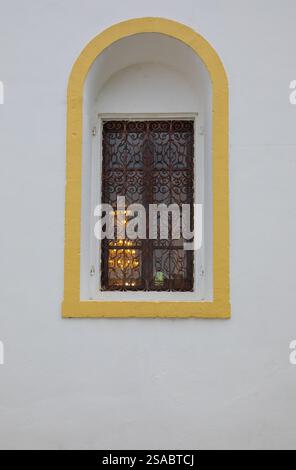 Mountain village Lakkoi with Agios Antonios church, church window ...