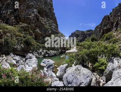 River flows through the Kourtaliatiko Gorge, Preveli Beach, south coast ...