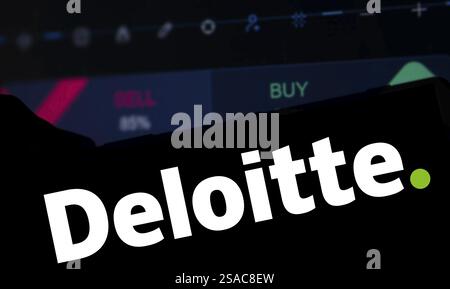 Deloitte logo is displyed on smartphone. Deloitte is a multinational ...