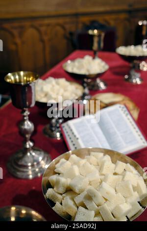 Protestant church. Bible, vine and bread on altar. Communion in memory ...