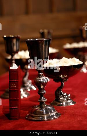 Protestant church. Bible, vine and bread on altar. Communion in memory ...