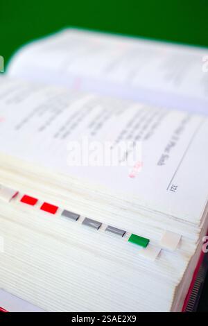 Open Bible with bookmarks on a church altar Stock Photo - Alamy
