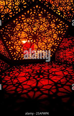 A nighttime view of intricate geometric light sculptures by HYBYCOZO ...