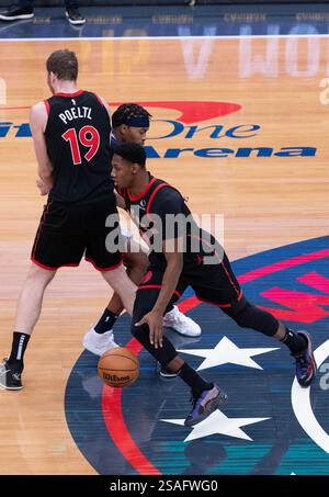 Toronto Raptors forward/guard RJ Barrett (9) fouls Charlotte Hornets ...