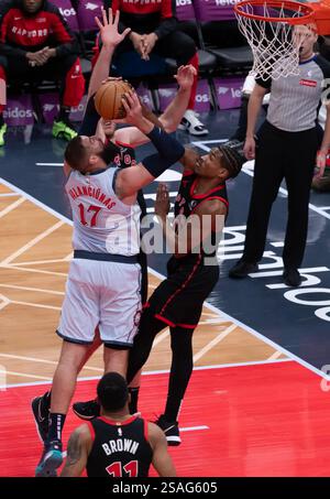 Toronto Raptors guard Ochai Agbaji (30) shoots beside Portland Trail ...