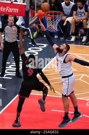 Toronto Raptors guard RJ Barrett (9) points to a member of the media as ...