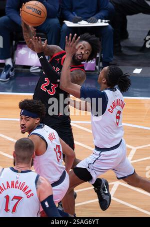 Toronto Raptors guard Jamal Shead (23) drives between Orlando Magic ...