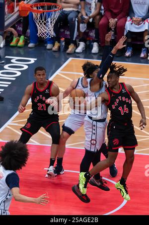 Toronto Raptors guard Ja'Kobe Walter (14) pushes the ball up court during the second half of an ...