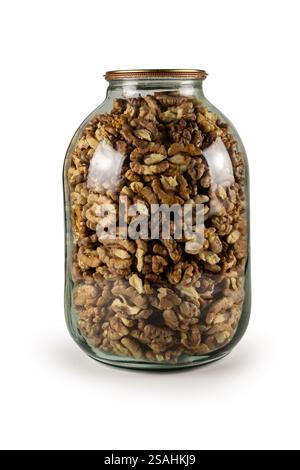 The walnut kernels in jar isolated on white background. close-up walnut ...