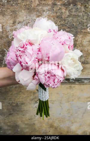 Flower arrangement of pink and white peonies. Natural background Stock ...