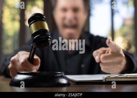 Judge banging judge's gavel index finger pointing. Law Lord wearing ...