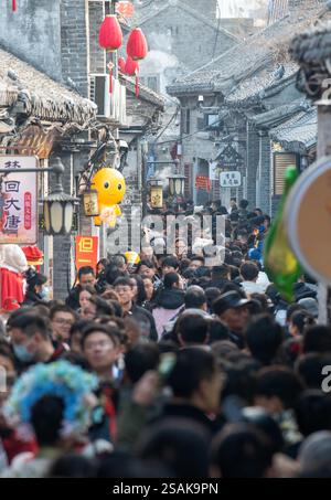 HUAI'AN, CHINA - JANUARY 30, 2025 - Tourists visit the Hexia Ancient ...