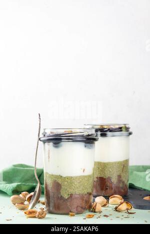 Dubai chocolate dessert cup, layered pistachio kadaif parfait cake with ...