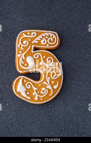 Gingerbread Cookie Number Five decorated with white sugar glaze ...