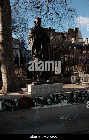 The feet of Mahatma Gandhi in his statue in Parliament Square ...