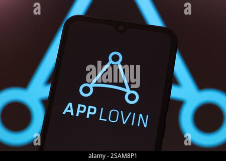 AppLovin logo displayed on a phone screen is seen in this illustration ...