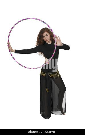 Young beautiful woman with a hula hoop Stock Photo - Alamy