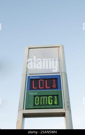A sign displays gas prices at a station in Ashland, Va., Tuesday, March ...
