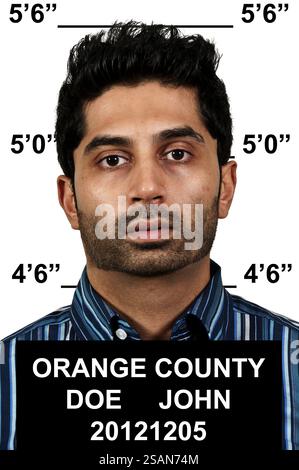 Mugshot of a handsome young man criminal Stock Photo - Alamy