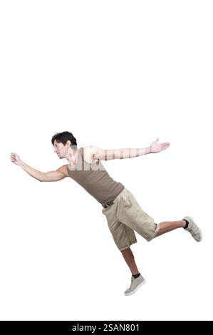 Handsome young man tripping slipping and falling Stock Photo - Alamy