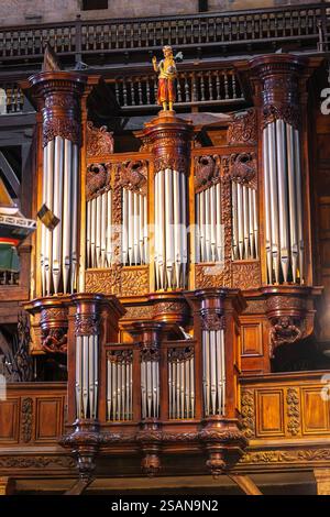 Saint Jean Baptiste church. Baroque angel in the light of a stained ...