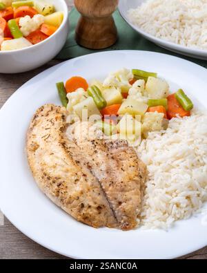 Fillet of tilapia or Saint Peter fish Oreochromis niloticus. Isolated ...