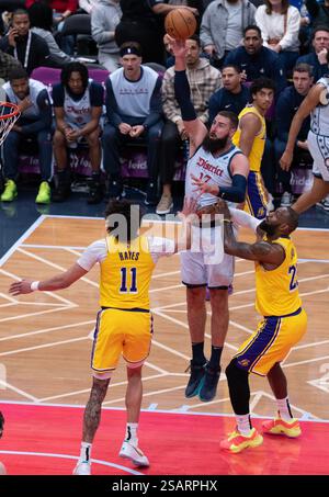 Los Angeles Lakers center Jaxson Hayes (11) goes up for a dunk as Los Angeles Clippers center ...