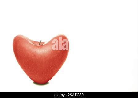 A ready to eat heart shaped apple Stock Photo - Alamy