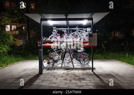 Bicycles, Modern, illuminated, two-storey bicycle racks at the Munich ...