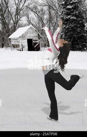 Beautiful young woman figure skater on ice skates Stock Photo - Alamy