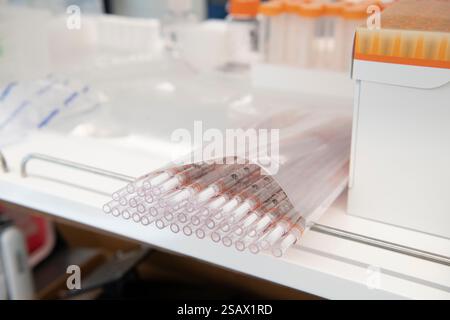 extended length pipette tips laying on biotech science lab shelf Stock ...