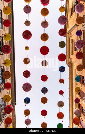 Ornate lanterns in a narrow street in the Old City of Dubrovnik ...