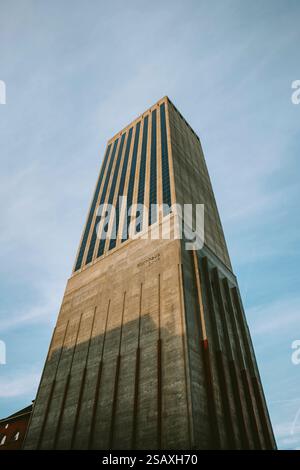 Low angle view of silo building against sky Stock Photo - Alamy