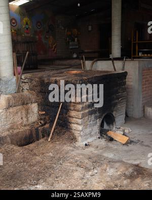 Mezcal is fermented and distilled in copper still tanks in artisanal ...