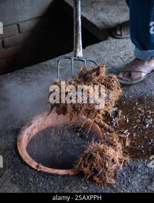 Mezcal is fermented and distilled in copper still tanks in artisanal ...