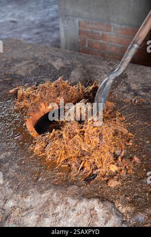 Mezcal is fermented and distilled in copper still tanks in artisanal ...