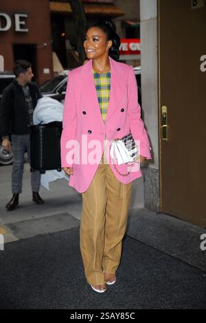 Actress Gabrielle Union wears a pink jacket as she goes out in midtown ...