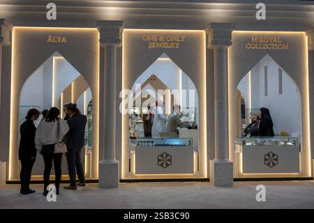 DOHA JEWELLERY AND WATCHES EXHIBITION People visit and look at gold and ...