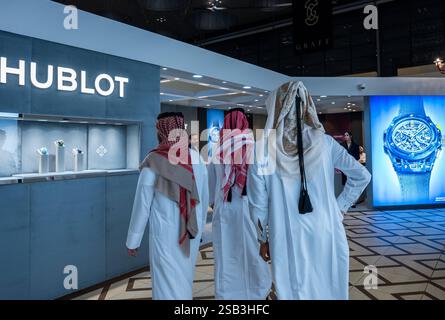 DOHA JEWELLERY AND WATCHES EXHIBITION People visit and look at gold and ...