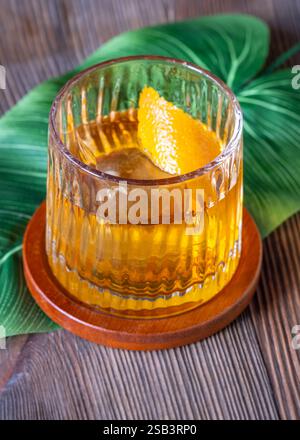 Banana Old Fashioned with orange zest garnish Stock Photo - Alamy