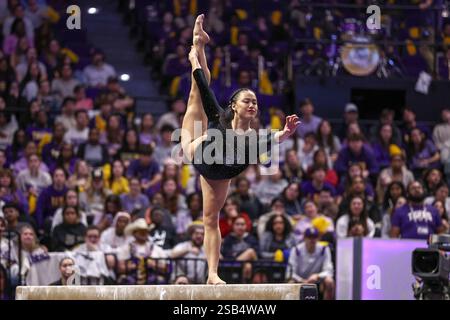 Missouri's Helen Hu competes on the balance beam during the NCAA women ...