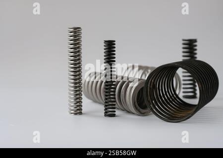 Set metal springs of different metals. Spare parts of the engineering ...