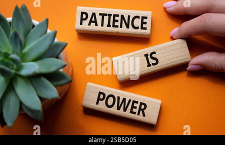 Patience is Power symbol. Concept words Patience is Power on wooden ...