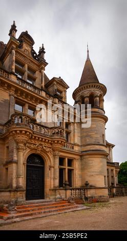 An imposing gothic style mansion situated in the countryside of England ...