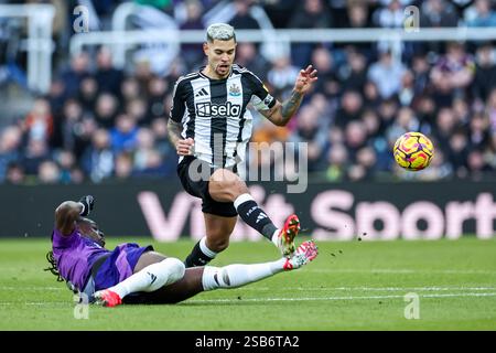 Bruno Guimaraes of Newcastle United is tackled by Manuel Ugarte of ...