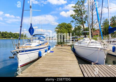 Boats anchoring at pier in Wierzba sailing port on Lake Beldany on ...