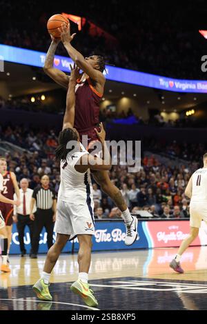 Virginia Tech Hokies forward Tobi Lawal (1) shoots the ball at Cassell ...