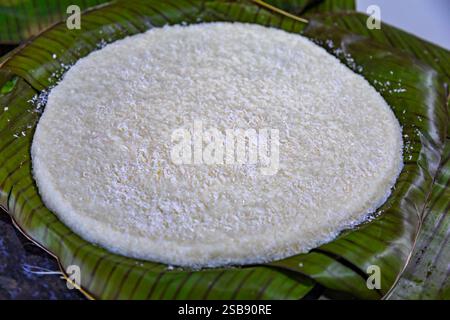 Amazonian coconut tapioca in banana leaf Stock Photo - Alamy