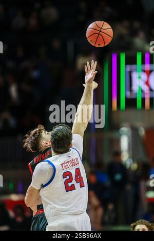 Stanford forward Maxime Raynaud, center, jogs after making a 3-point ...