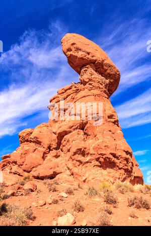 Large rock formation with a pointy top. The rock formation is ...
